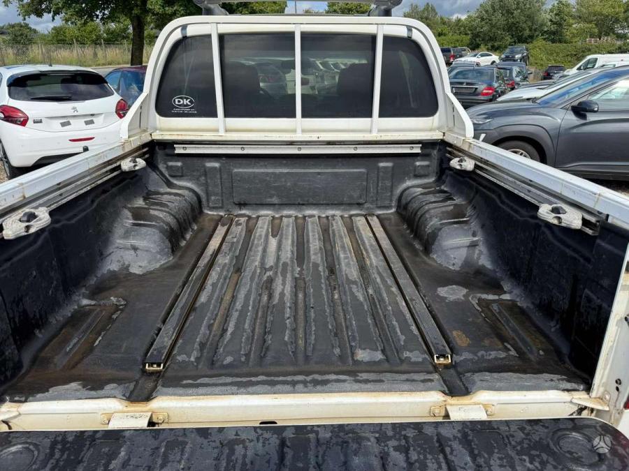 Balts Nissan Navara 2015 Tauragė, ar dzinēja tilpumu 2.50 L un nobraukumu 320 tūkst. km par 6800 €, foto 14 vietnē AUTOMOTO.COM.LV