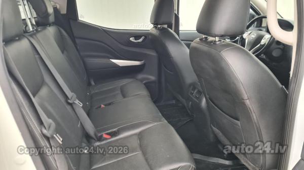 White Nissan Navara 2019 in Tallinn, with an engine capacity of 2.30 L and mileage of 294 thousand km for 14990 €, photo 11 on AUTOMOTO.COM.LV