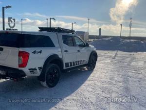 White Nissan Navara 2021 in Tallinn, with an engine capacity of 2.30 L and mileage of 74 thousand km for 34990 €, photo 7 on AUTOMOTO.COM.LV