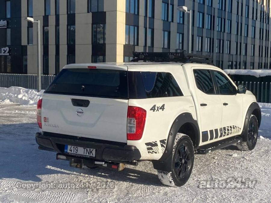 White Nissan Navara 2021 in Tallinn, with an engine capacity of 2.30 L and mileage of 74 thousand km for 34990 €, photo 13 on AUTOMOTO.COM.LV