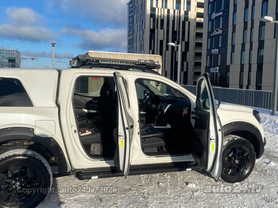 White Nissan Navara 2021 in Tallinn, with an engine capacity of 2.30 L and mileage of 74 thousand km for 34990 €, photo 18 on AUTOMOTO.COM.LV