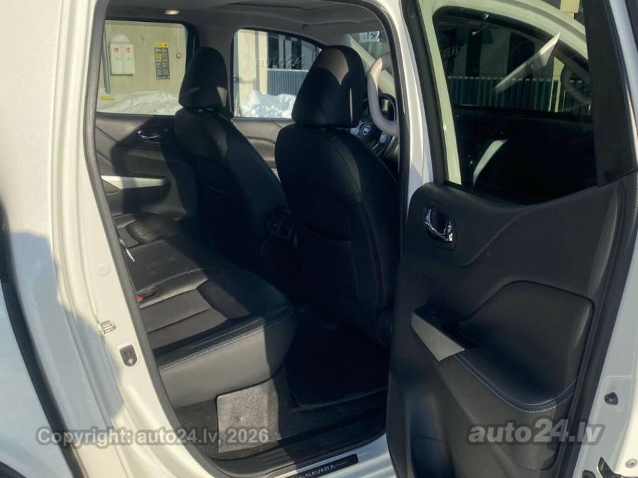 White Nissan Navara 2021 in Tallinn, with an engine capacity of 2.30 L and mileage of 74 thousand km for 34990 €, photo 20 on AUTOMOTO.COM.LV