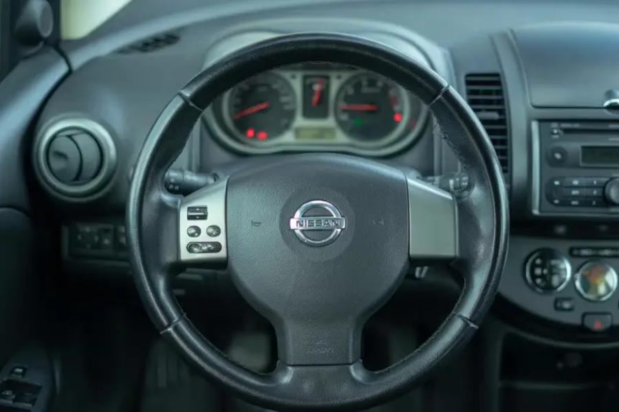 Melns Nissan Note 2006 Liepāja, ar dzinēja tilpumu 1.50 L un nobraukumu 210 tūkst. km par 1600 €, foto 12 vietnē AUTOMOTO.COM.LV