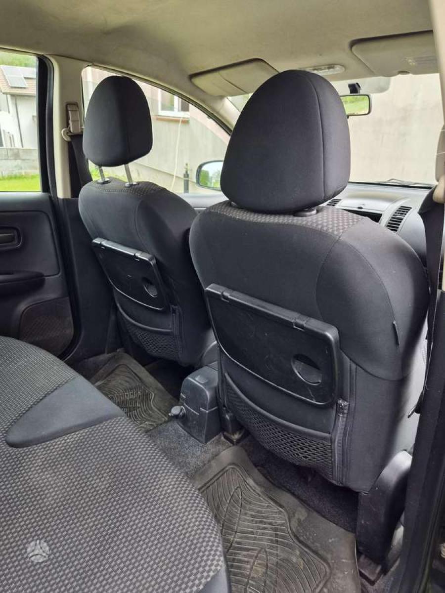 Black Nissan Note 2007 in Vilnius, with an engine capacity of 1.46 L and mileage of 290 thousand km for 1650 €, photo 8 on AUTOMOTO.COM.LV