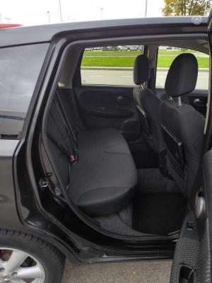 Black Nissan Note 2007 in Siauliai, with an engine capacity of 1.39 L and mileage of 198 thousand km for 1750 €, photo 14 on AUTOMOTO.COM.LV