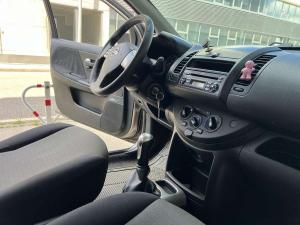 Brown Nissan Note 2011 in Vilnius, with an engine capacity of 1.40 L and mileage of 208 thousand km for 1750 €, photo 32 on AUTOMOTO.COM.LV