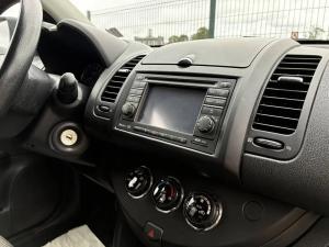 Brown Nissan Note 2011 in Saldus, with an engine capacity of 1.40 L and mileage of 184 thousand km for 4300 €, photo 15 on AUTOMOTO.COM.LV