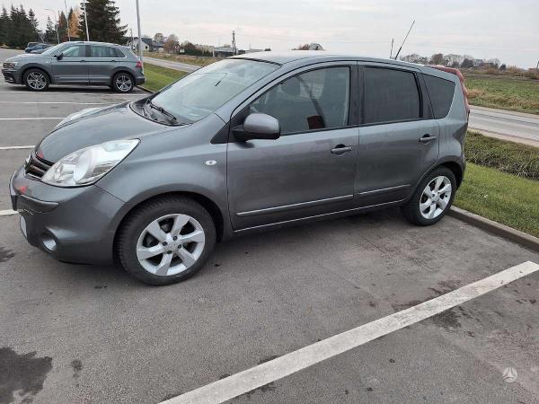Grey Nissan Note 2011 in Kaunas, with an engine capacity of 1.39 L and mileage of 194 thousand km for 3099 €, photo 1 on AUTOMOTO.COM.LV