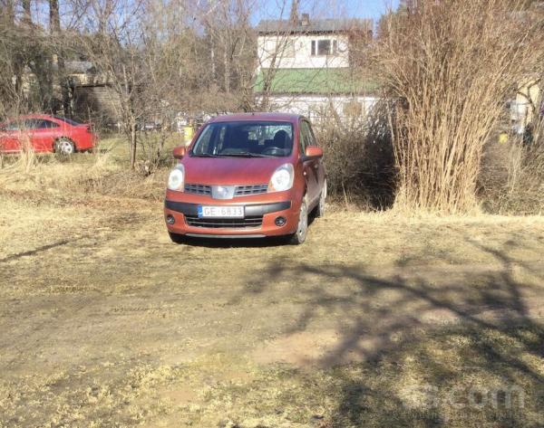 Orange Nissan Note 2006 in Ogre, with an engine capacity of 1.40 L and mileage of 213 thousand km for 1200 €, photo 1 on AUTOMOTO.COM.LV