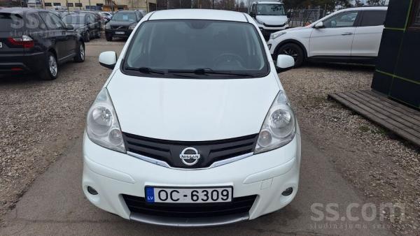 White Nissan Note 2011 in Riga, with an engine capacity of 1.50 L and mileage of 298 thousand km for 3490 €, photo 7 on AUTOMOTO.COM.LV
