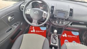 White Nissan Note 2011 in Riga, with an engine capacity of 1.50 L and mileage of 298 thousand km for 3490 €, photo 12 on AUTOMOTO.COM.LV