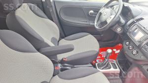 White Nissan Note 2011 in Riga, with an engine capacity of 1.50 L and mileage of 298 thousand km for 3490 €, photo 18 on AUTOMOTO.COM.LV