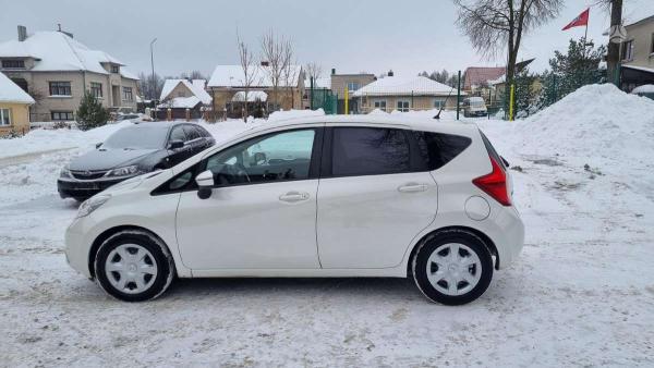 White Nissan Note 2014 in Siauliai, with an engine capacity of 1.20 L and mileage of 180 thousand km for 3650 €, photo 6 on AUTOMOTO.COM.LV