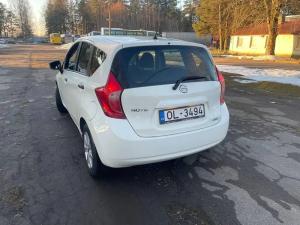 White Nissan Note 2014 in Riga, with an engine capacity of 1.20 L and mileage of 260 thousand km for 1250 €, photo 4 on AUTOMOTO.COM.LV