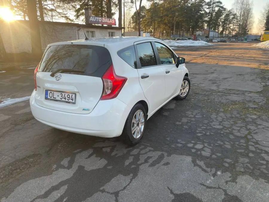 White Nissan Note 2014 in Riga, with an engine capacity of 1.20 L and mileage of 260 thousand km for 1250 €, photo 12 on AUTOMOTO.COM.LV