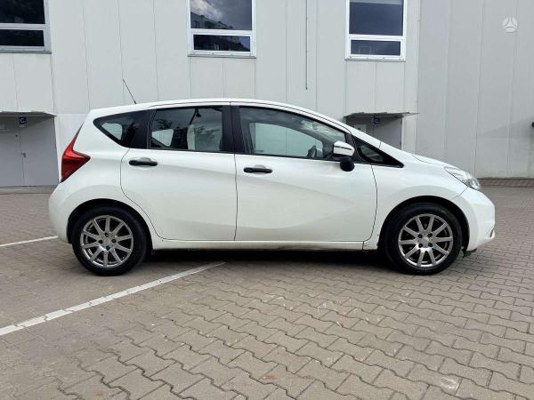 White Nissan Note 2015 in Vilnius, with an engine capacity of 1.20 L and mileage of 217 thousand km for 2400 €, photo 5 on AUTOMOTO.COM.LV