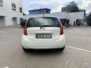 White Nissan Note 2015 in Vilnius, with an engine capacity of 1.20 L and mileage of 217 thousand km for 2400 €, photo 6 on AUTOMOTO.COM.LV