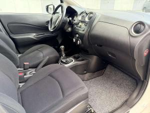 White Nissan Note 2015 in Vilnius, with an engine capacity of 1.20 L and mileage of 217 thousand km for 2400 €, photo 9 on AUTOMOTO.COM.LV