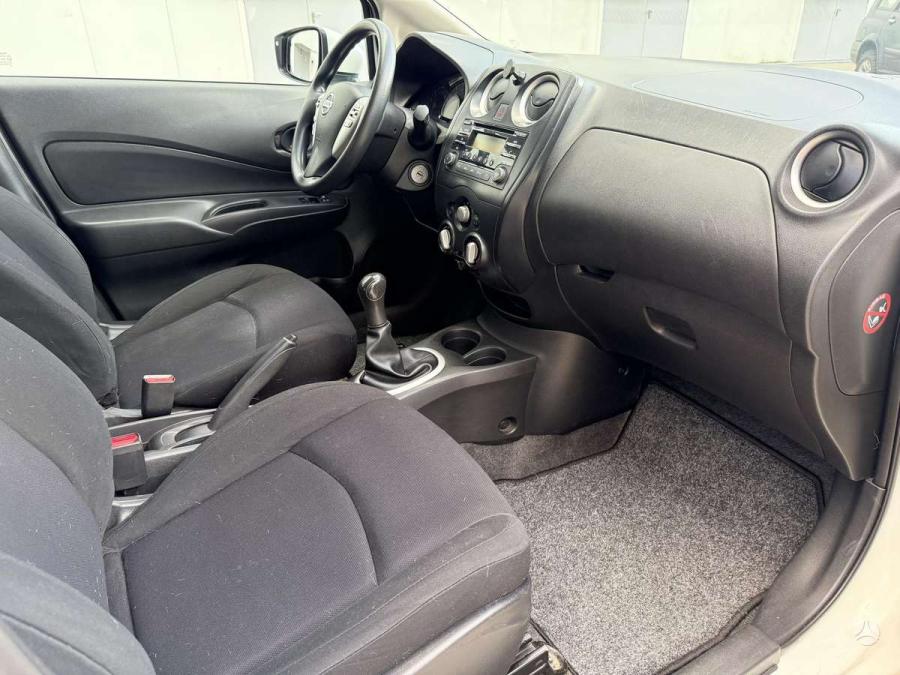 White Nissan Note 2015 in Vilnius, with an engine capacity of 1.20 L and mileage of 217 thousand km for 2400 €, photo 9 on AUTOMOTO.COM.LV