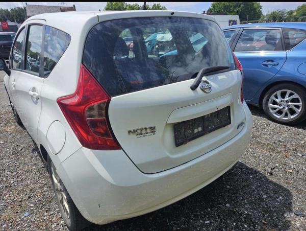 White Nissan Note 2015 in Taurage, with an engine capacity of 1.48 L and mileage of 183 thousand km for 3400 €, photo 2 on AUTOMOTO.COM.LV