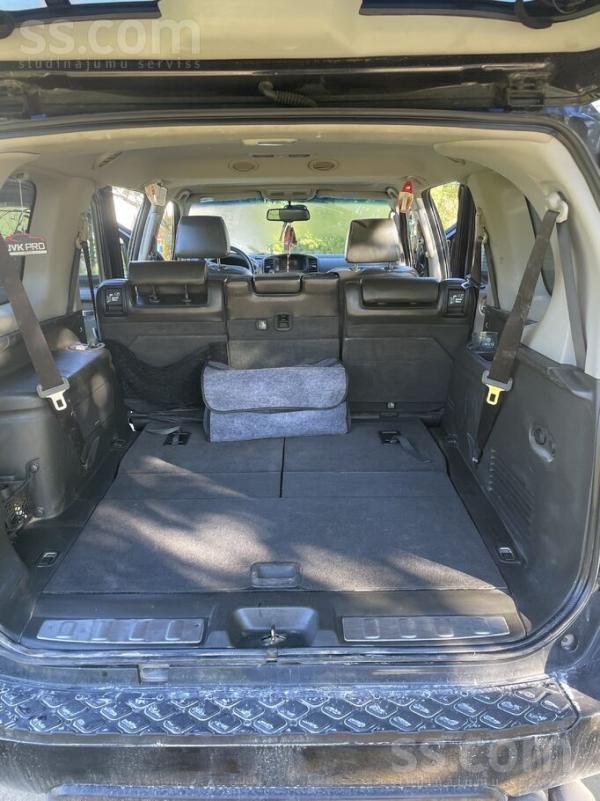 Melns Nissan Pathfinder 2011 Rīga, ar dzinēja tilpumu 3.00 L un nobraukumu 363 tūkst. km par 7500 €, foto 4 vietnē AUTOMOTO.COM.LV