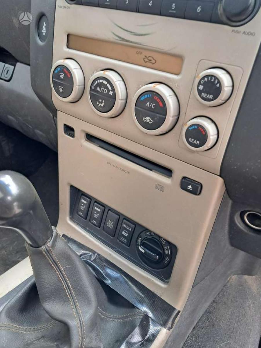 Brown Nissan Pathfinder 2009 in Kaunas, with an engine capacity of 2.49 L and mileage of 181 thousand km for 3000 €, photo 15 on AUTOMOTO.COM.LV