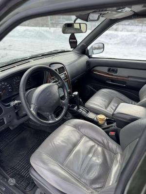 Zaļš Nissan Pathfinder 1999 Viļņa, ar dzinēja tilpumu 3.27 L un nobraukumu 300 tūkst. km par 4500 €, foto 15 vietnē AUTOMOTO.COM.LV