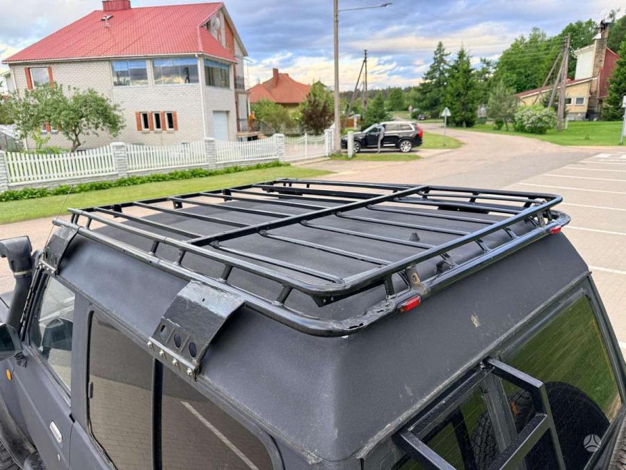 Melns Nissan Patrol 1990 Viļņa, ar dzinēja tilpumu 2.83 L un nobraukumu 200 tūkst. km par 8700 €, foto 22 vietnē AUTOMOTO.COM.LV