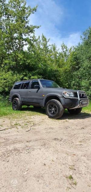 Melns Nissan Patrol 1999 Viļņa, ar dzinēja tilpumu 2.80 L un nobraukumu 263 tūkst. km par 6000 €, foto 7 vietnē AUTOMOTO.COM.LV