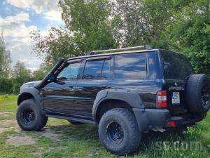 Melns Nissan Patrol 2000 Jelgava, ar dzinēja tilpumu 3.00 L un nobraukumu 276 tūkst. km par 12500 €, foto 13 vietnē AUTOMOTO.COM.LV
