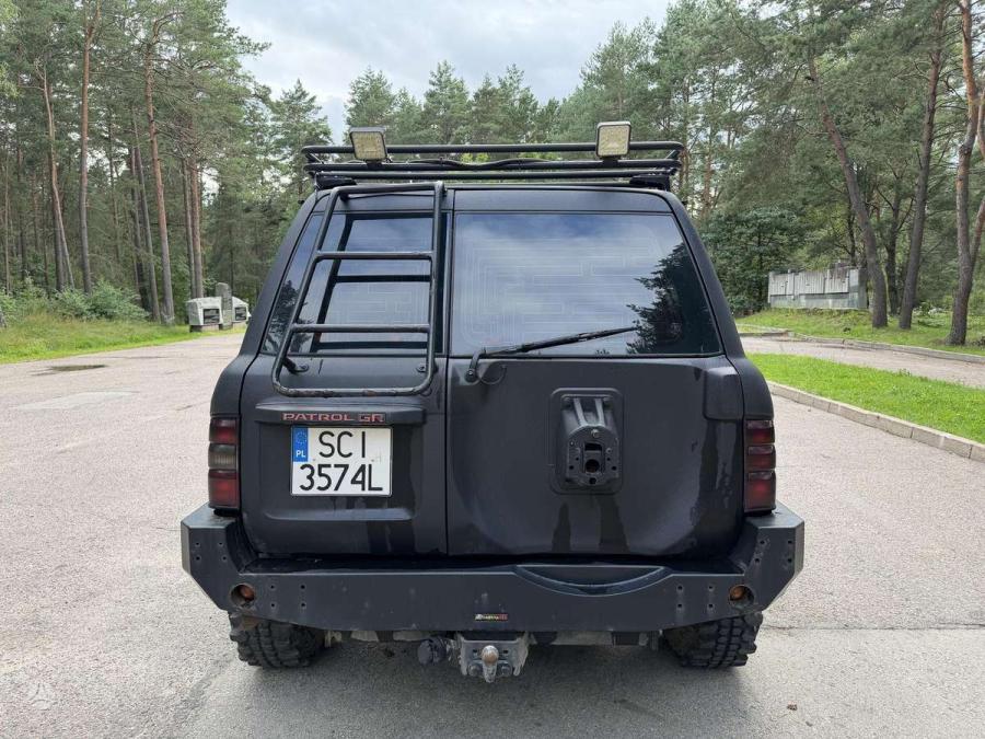 Melns Nissan Patrol 2000 Viļņa, ar dzinēja tilpumu 2.83 L un nobraukumu 253 tūkst. km par 9400 €, foto 6 vietnē AUTOMOTO.COM.LV