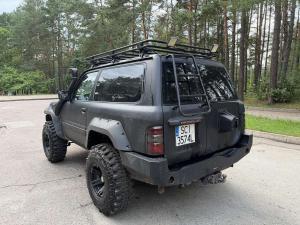 Melns Nissan Patrol 2000 Viļņa, ar dzinēja tilpumu 2.83 L un nobraukumu 253 tūkst. km par 9400 €, foto 7 vietnē AUTOMOTO.COM.LV