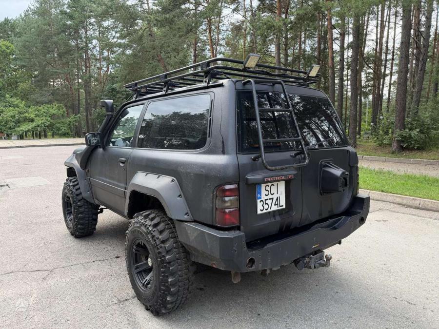 Melns Nissan Patrol 2000 Viļņa, ar dzinēja tilpumu 2.83 L un nobraukumu 253 tūkst. km par 9400 €, foto 7 vietnē AUTOMOTO.COM.LV