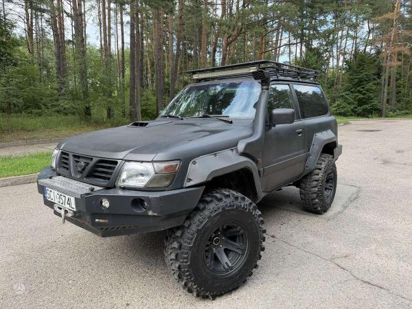 Melns Nissan Patrol 2000 Viļņa, ar dzinēja tilpumu 2.83 L un nobraukumu 253 tūkst. km par 9400 €, foto 7 vietnē AUTOMOTO.COM.LV