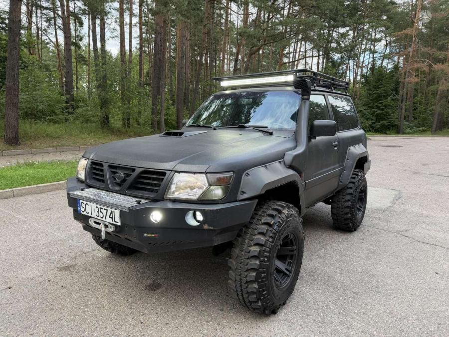 Melns Nissan Patrol 2000 Viļņa, ar dzinēja tilpumu 2.83 L un nobraukumu 253 tūkst. km par 9400 €, foto 13 vietnē AUTOMOTO.COM.LV