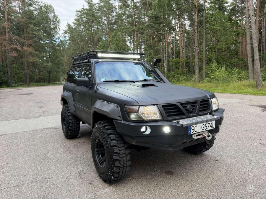 Melns Nissan Patrol 2000 Viļņa, ar dzinēja tilpumu 2.83 L un nobraukumu 253 tūkst. km par 9400 €, foto 14 vietnē AUTOMOTO.COM.LV