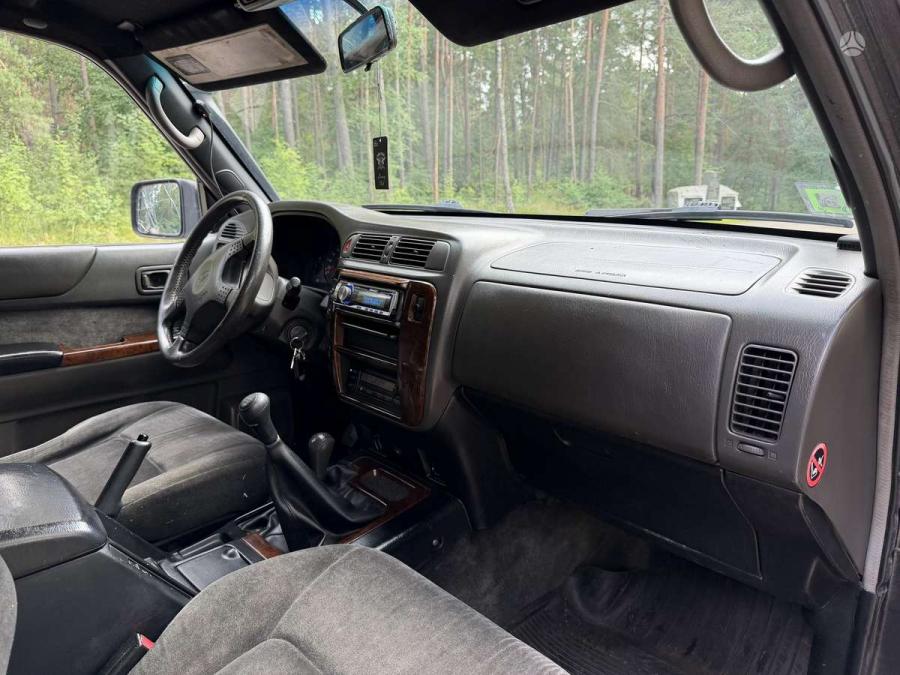 Melns Nissan Patrol 2000 Viļņa, ar dzinēja tilpumu 2.83 L un nobraukumu 253 tūkst. km par 9400 €, foto 24 vietnē AUTOMOTO.COM.LV