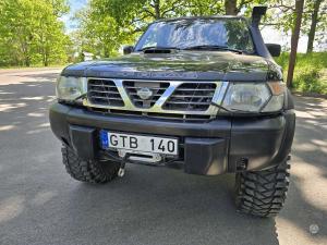 Melns Nissan Patrol 2003 Jurbarkas, ar dzinēja tilpumu 3.00 L un nobraukumu 230 tūkst. km par 11300 €, foto  vietnē AUTOMOTO.COM.LV