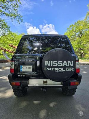 Black Nissan Patrol 2003 in Jurbarkas, with an engine capacity of 3.00 L and mileage of 230 thousand km for 11300 €, photo 13 on AUTOMOTO.COM.LV