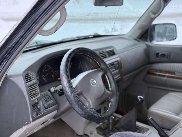 Melns Nissan Patrol 2005 Viļņa, ar dzinēja tilpumu 3.00 L un nobraukumu 302 tūkst. km par 5500 €, foto 8 vietnē AUTOMOTO.COM.LV