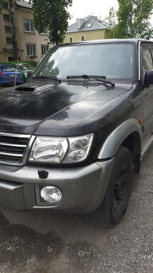Black Nissan Patrol 2005 in Tallinn, with an engine capacity of 3.00 L and mileage of 246 thousand km for 6600 €, photo 14 on AUTOMOTO.COM.LV