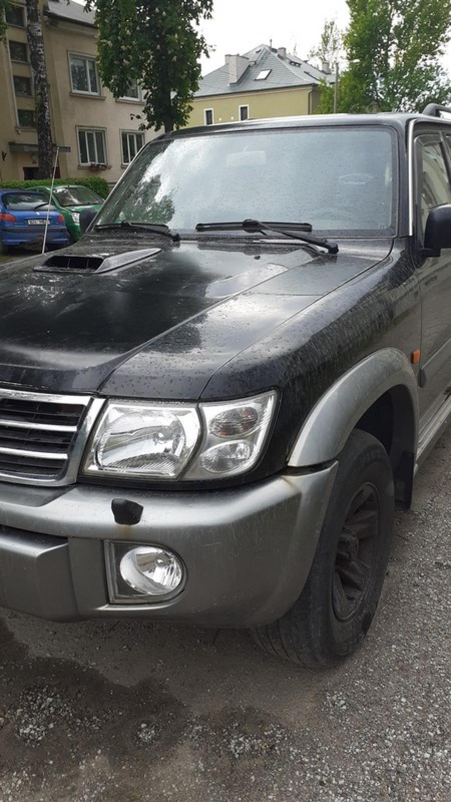 Black Nissan Patrol 2005 in Tallinn, with an engine capacity of 3.00 L and mileage of 246 thousand km for 6600 €, photo 14 on AUTOMOTO.COM.LV