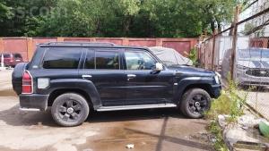 Black Nissan Patrol 2007 in Riga, with an engine capacity of 3.00 L and mileage of 244 thousand km for 4200 €, photo 12 on AUTOMOTO.COM.LV