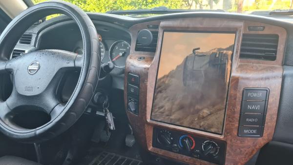 Melns Nissan Patrol 2009 Mažeikiai, ar dzinēja tilpumu 3.00 L un nobraukumu 318 tūkst. km par 21000 €, foto 8 vietnē AUTOMOTO.COM.LV
