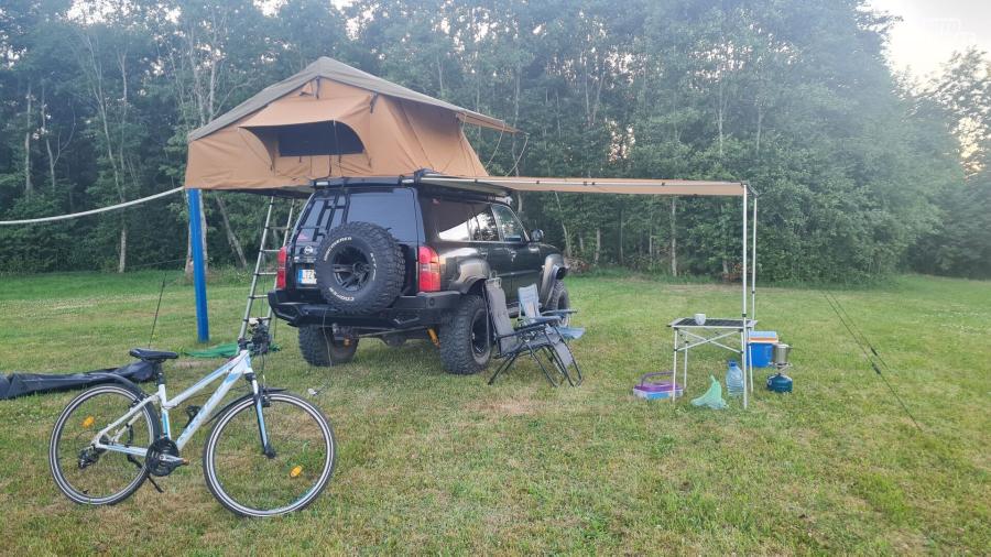 Черный Ниссан Патрол 2009 в Мажейкяй, объемом двигателя 3.00 л и пробегом 318 тыс. км за 21000 €, фото 13 на AUTOMOTO.COM.LV