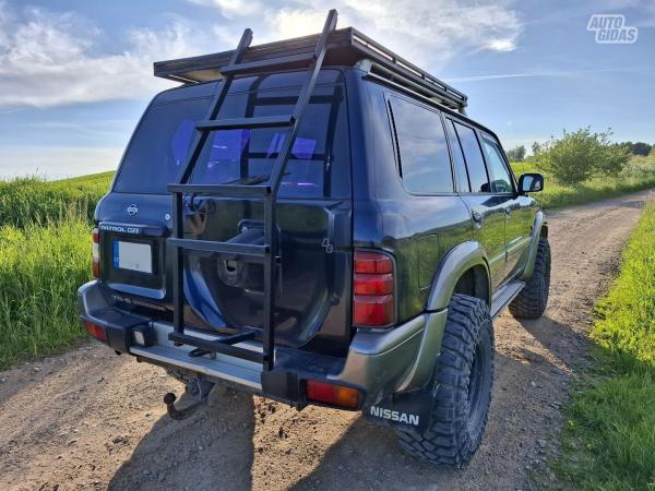 Blue Nissan Patrol 2000 in Vilnius, with an engine capacity of 3.00 L and mileage of 269 thousand km for 8700 €, photo 6 on AUTOMOTO.COM.LV