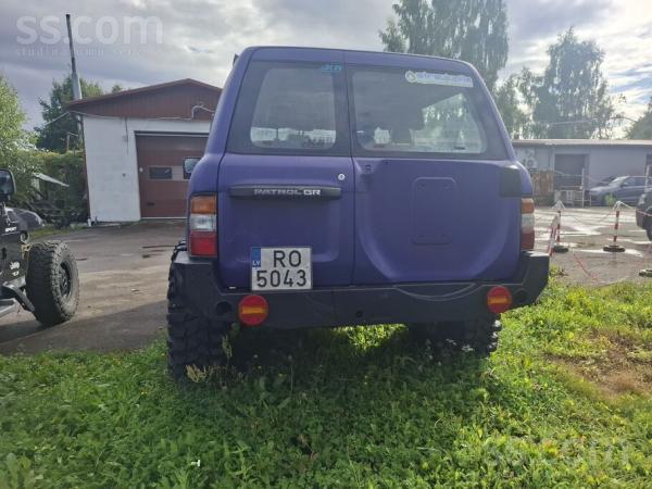 Blue Nissan Patrol 2000 in Riga, with an engine capacity of 2.80 L and mileage of 312 thousand km for 7500 €, photo 5 on AUTOMOTO.COM.LV