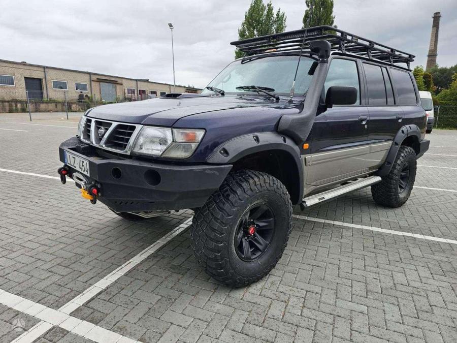 Blue Nissan Patrol 2003 in Taurage, with an engine capacity of 3.00 L and mileage of 223 thousand km for 25000 €, photo 3 on AUTOMOTO.COM.LV