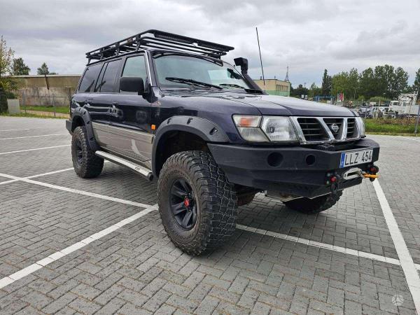 Blue Nissan Patrol 2003 in Taurage, with an engine capacity of 3.00 L and mileage of 223 thousand km for 25000 €, photo 1 on AUTOMOTO.COM.LV