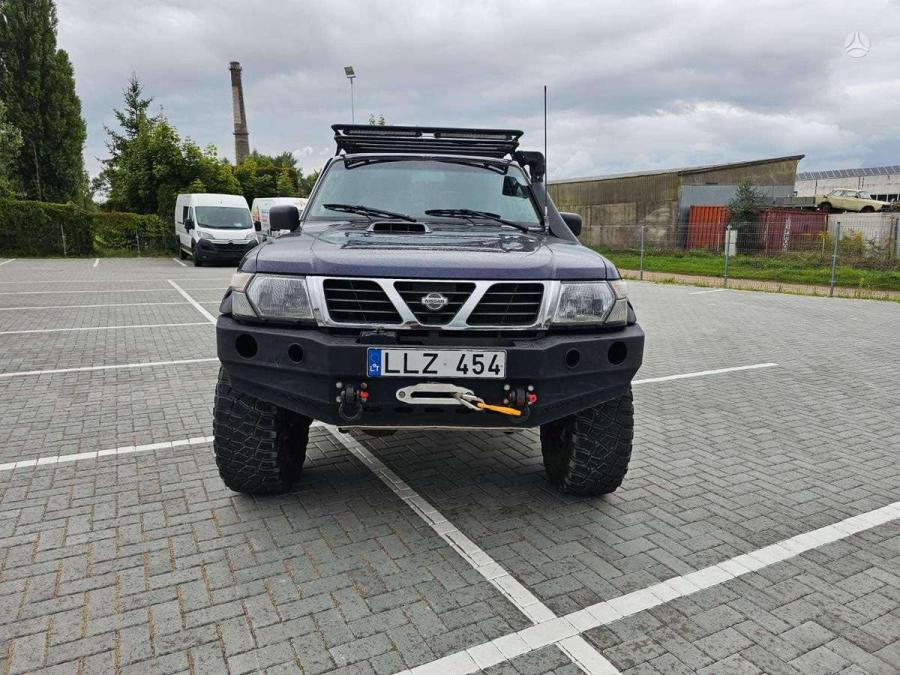 Blue Nissan Patrol 2003 in Taurage, with an engine capacity of 3.00 L and mileage of 223 thousand km for 25000 €, photo 2 on AUTOMOTO.COM.LV